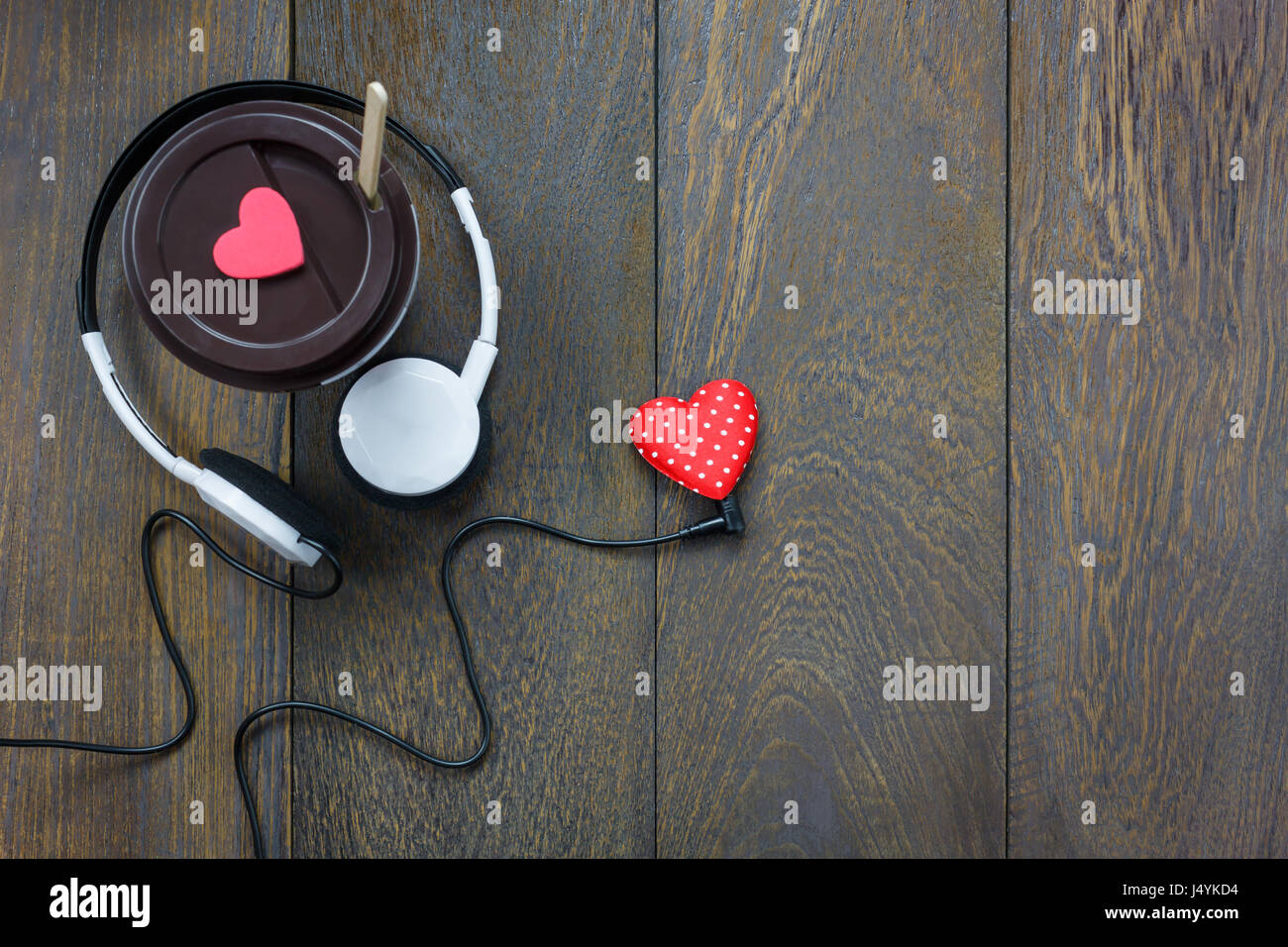 Top view music with valentines day background.Headphones,cup of coffee ...