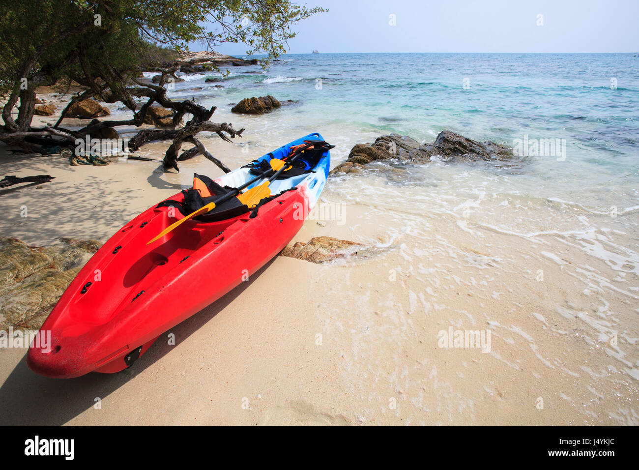 sea kayak canoe on sea sand beach with beautiful nature coast beach ...