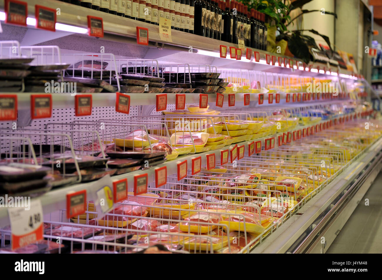 Beef steak red meat on display in a butchers shop Stock Photo - Alamy