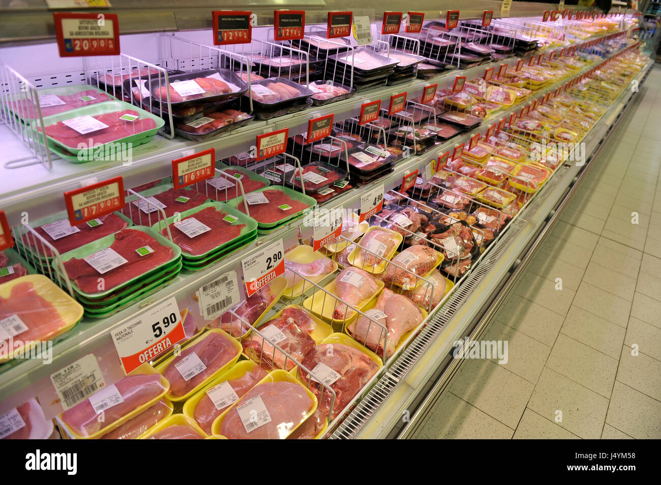 Beef steak red meat on display in a butchers shop Stock Photo - Alamy