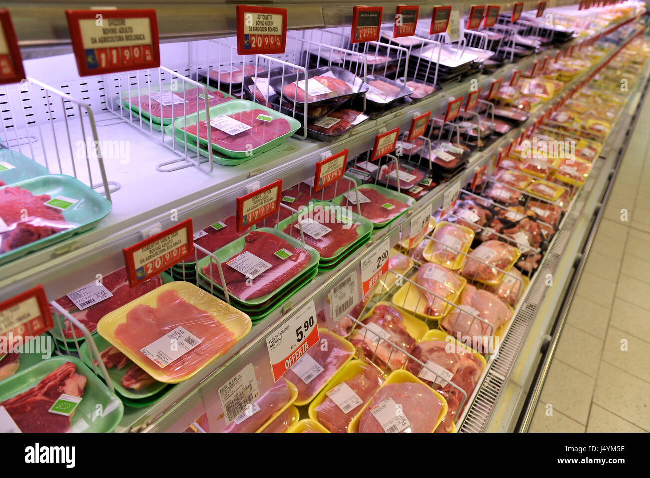 Beef steak red meat on display in a butchers shop Stock Photo - Alamy