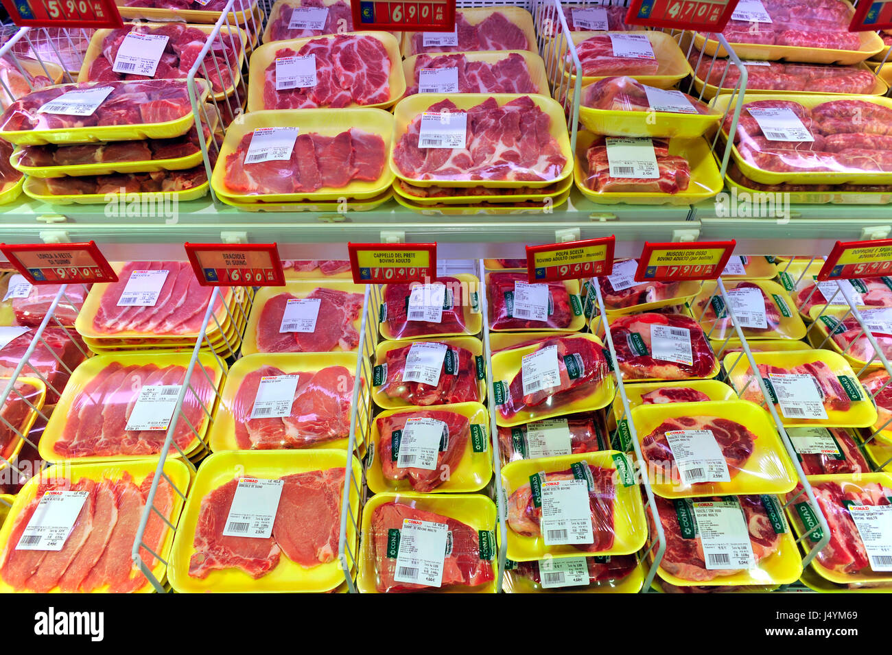 Beef steak red meat on display in a butchers shop Stock Photo - Alamy
