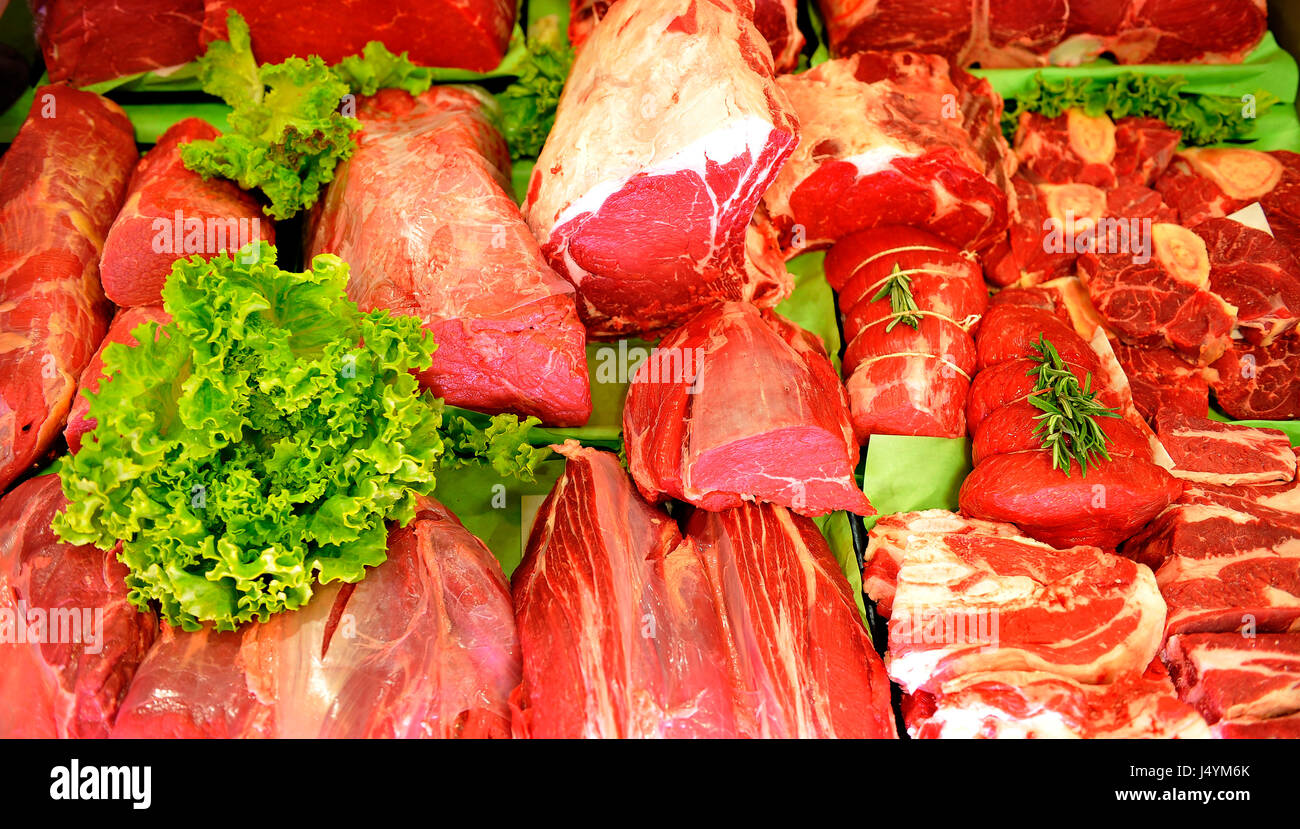Beef steak red meat on display in a butchers shop Stock Photo - Alamy