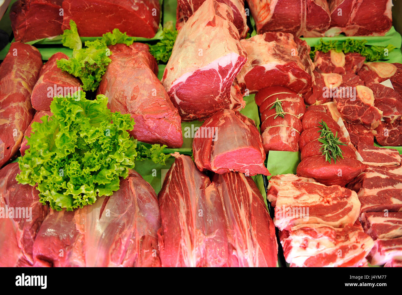 Beef steak red meat on display in a butchers shop Stock Photo - Alamy