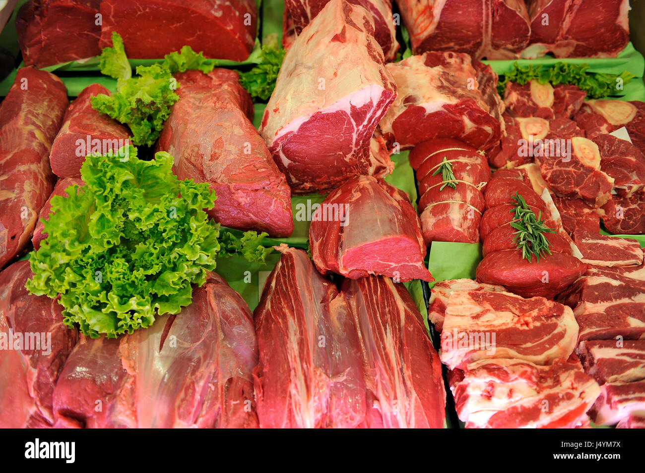 Beef steak red meat on display in a butchers shop Stock Photo - Alamy