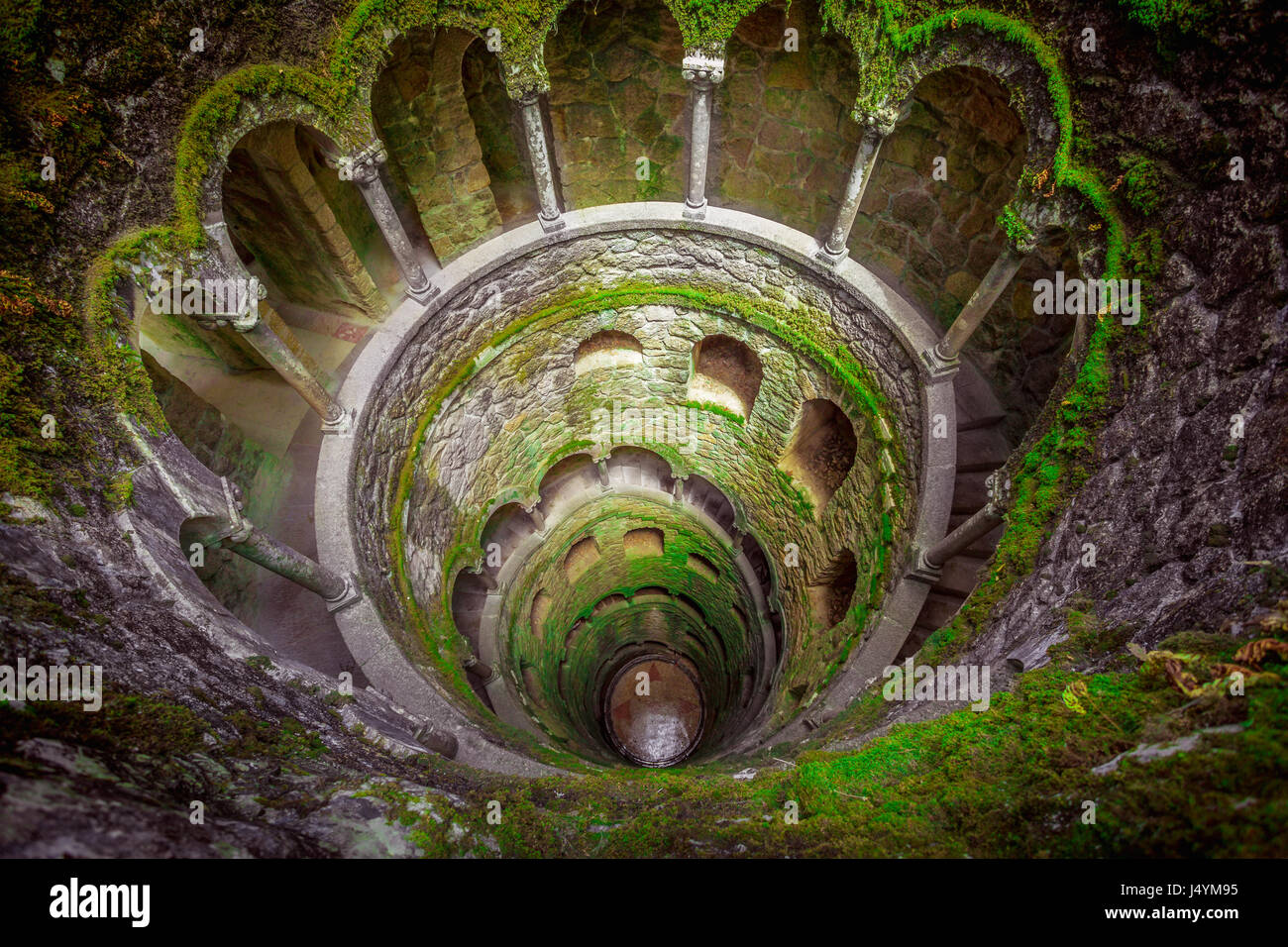 Initiation Wells. Sintra, Portugal. Spiral staircase with arched ...