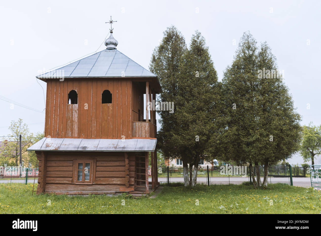 Traditional old wooden bell tower near the church, Western Ukraine ...