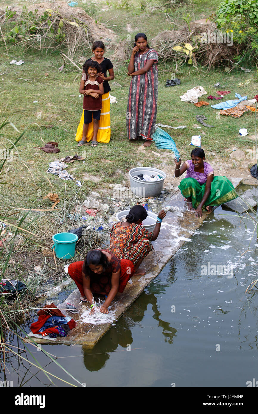 Indian womans washing clothes near the road, Karnataka, India Stock ...