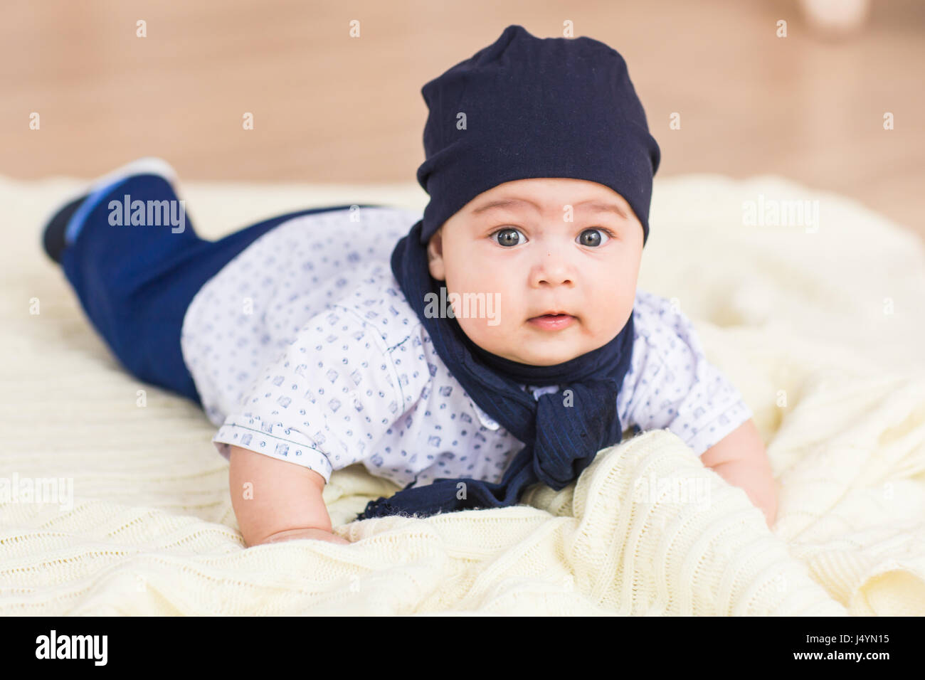 Child, childhood and infant concept - close-up of happy little baby boy ...