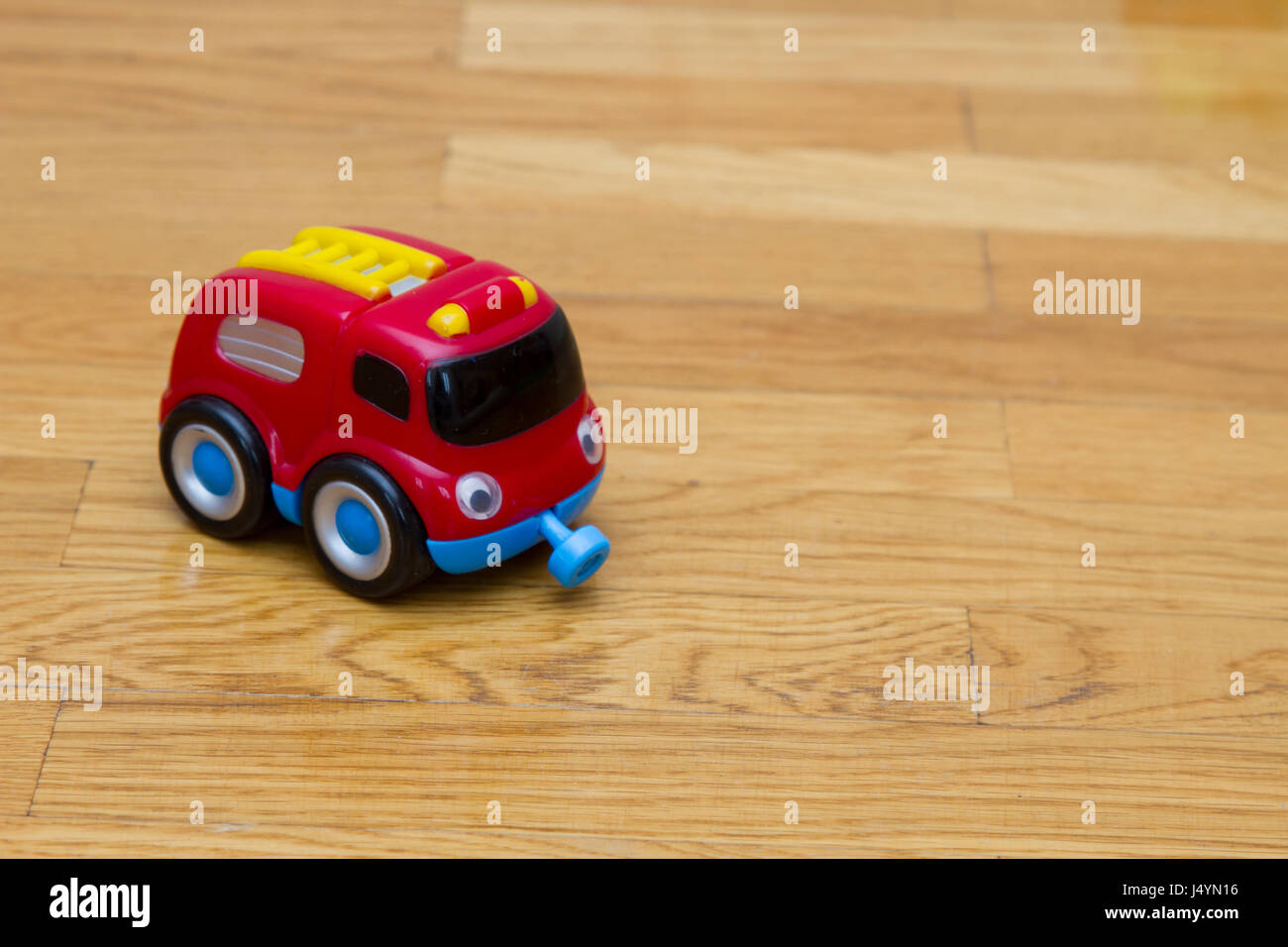 Red Little toy car Stock Photo - Alamy