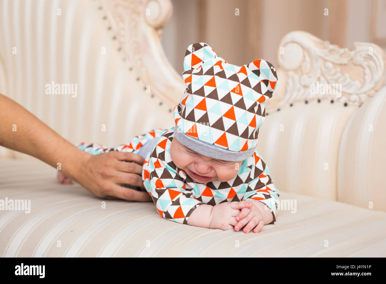 Portrait of crying baby boy Stock Photo - Alamy