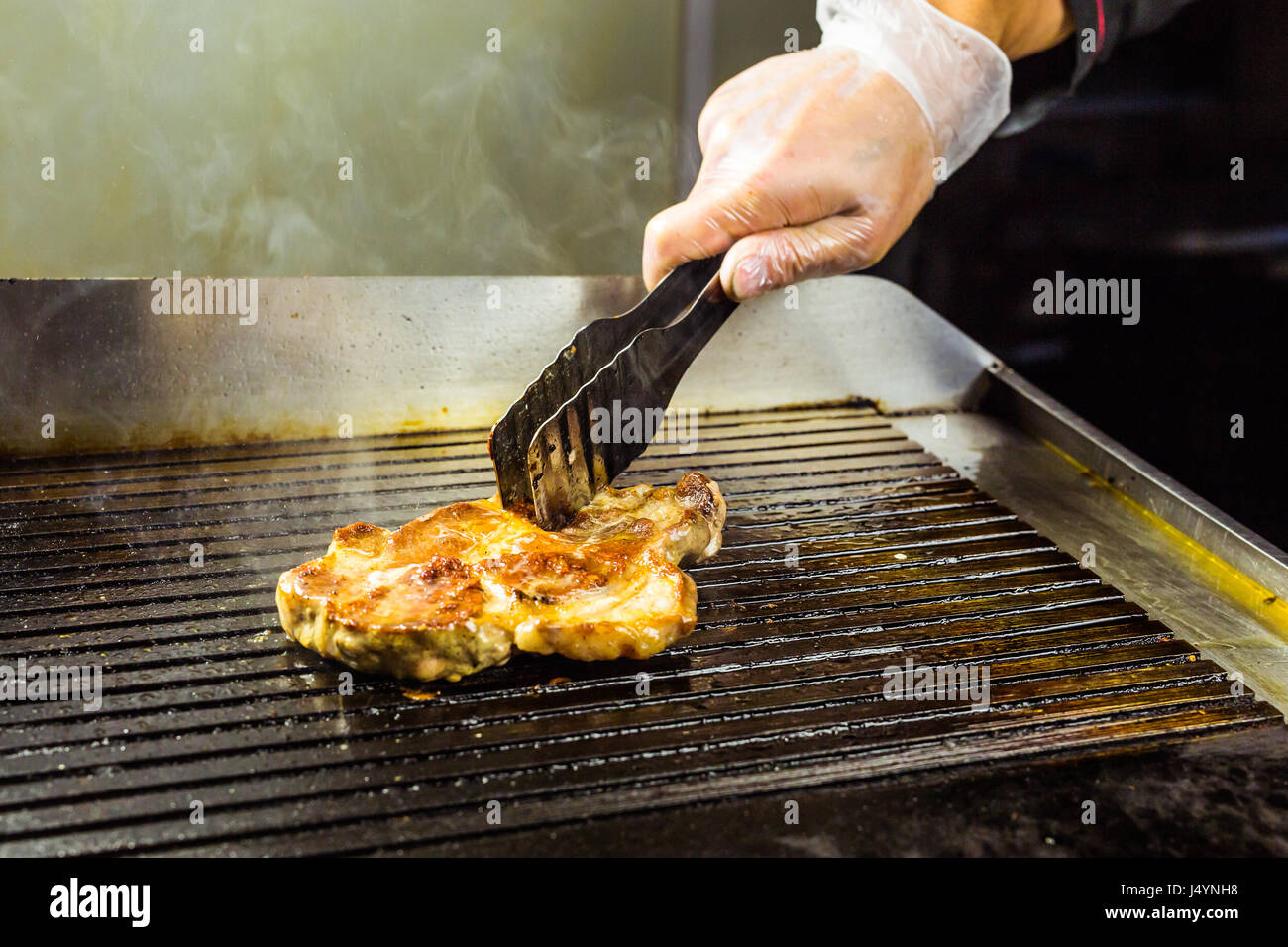 closeup of a steak on grill Stock Photo - Alamy