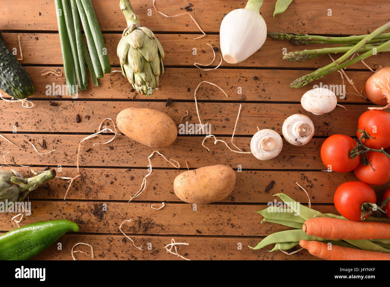 Assortment of vegetables on wood table. Horizontal composition. Top ...