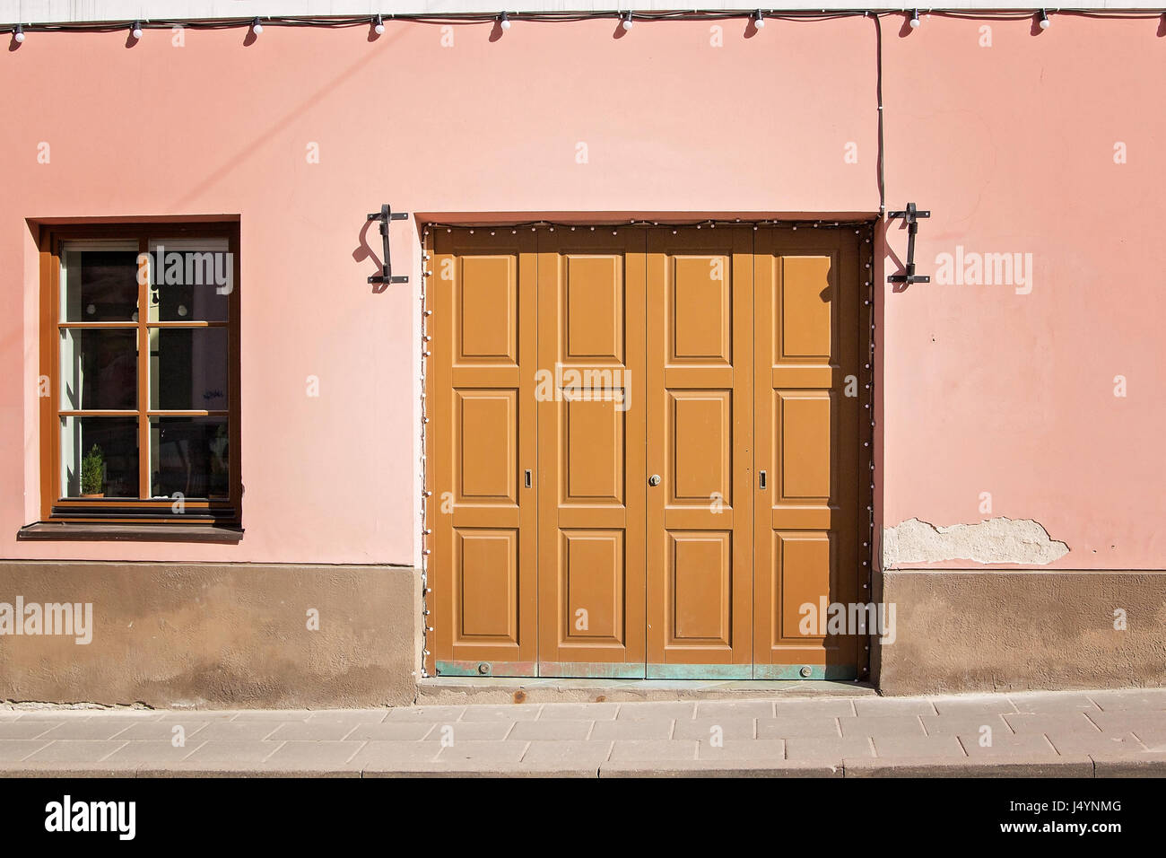 Urban background. Street view to old house with painted wall, window ...