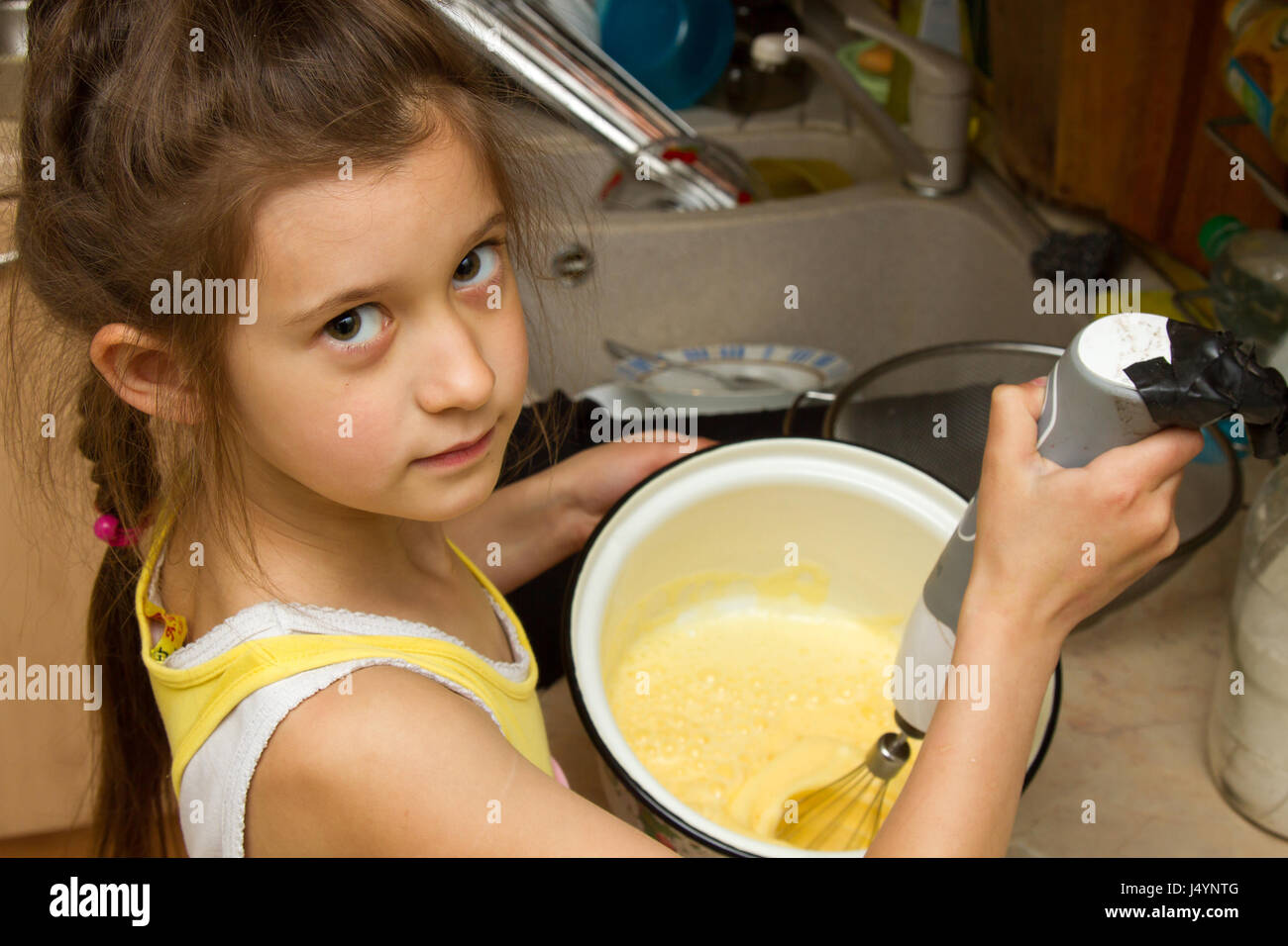 Kids making mess in kitchen hi-res stock photography and images - Alamy