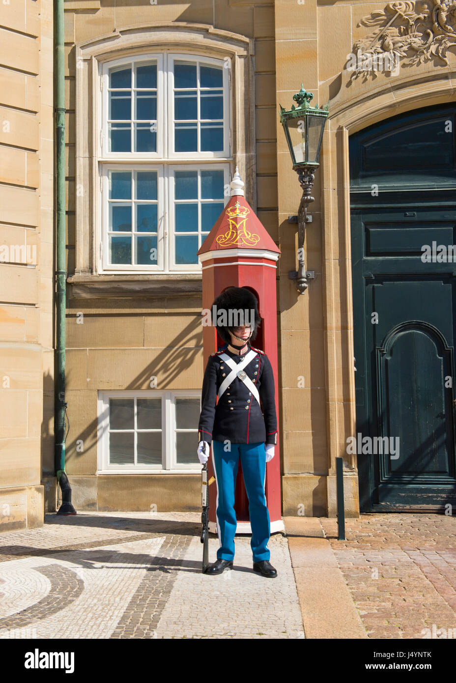 Royal Guard standing at sentry box at the gates to the Royal Palace of ...