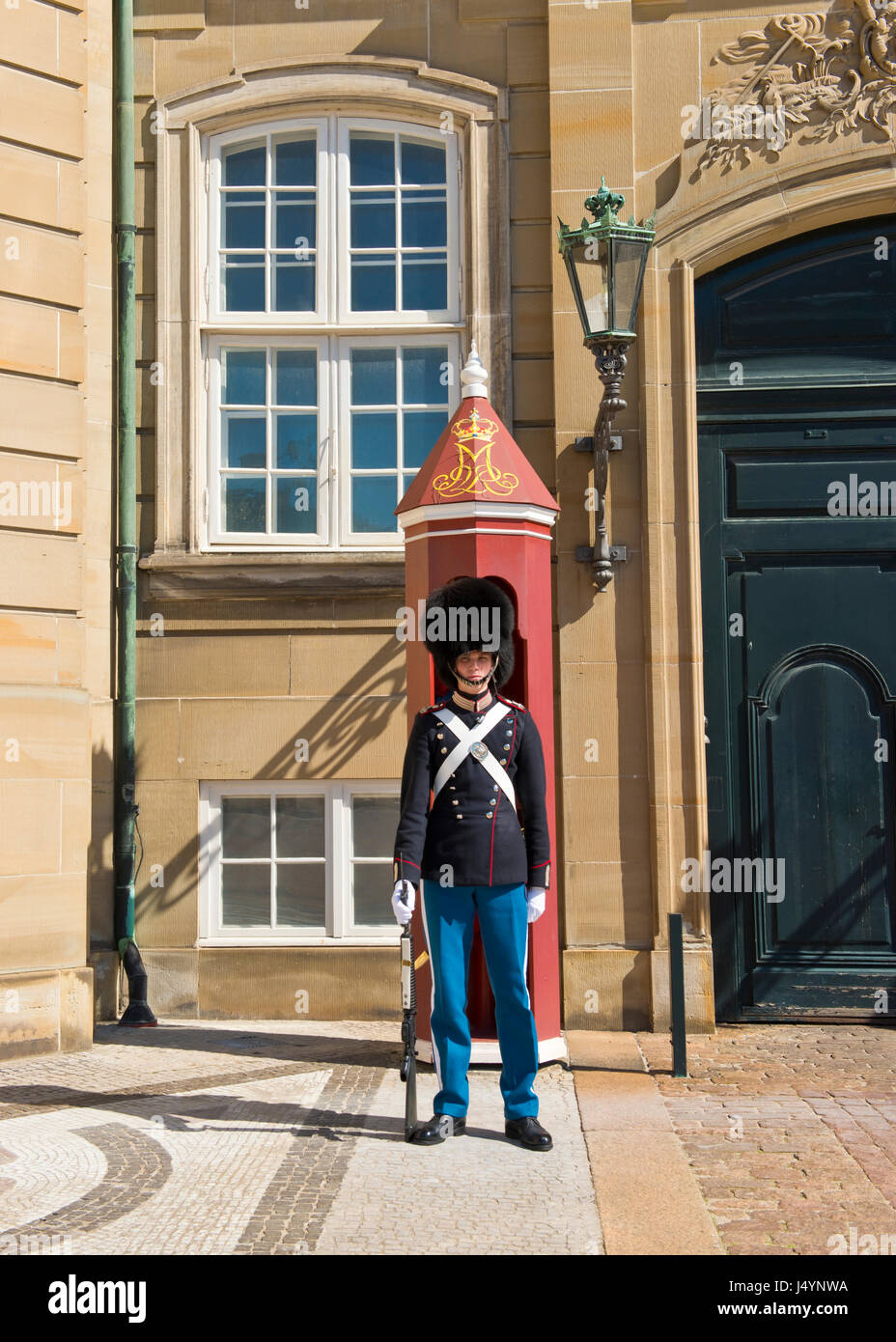 Royal Guard standing at sentry box at the gates to the Royal Palace of ...