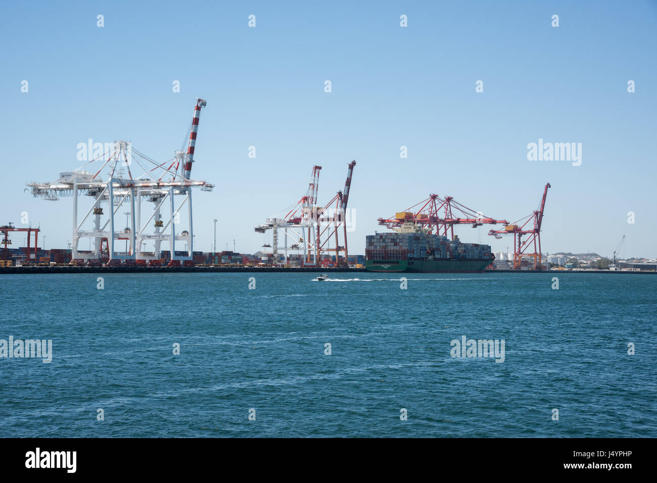 Large cranes, ships and dockside view along the Swan River inlet at ...