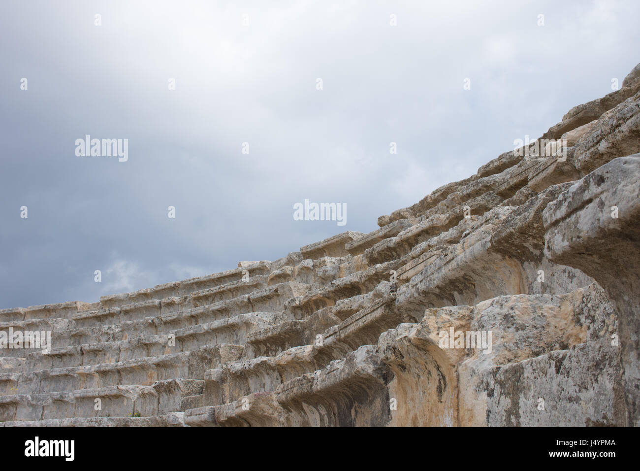Close up of ancient carved stone steps of Roman theater in Jerash ...