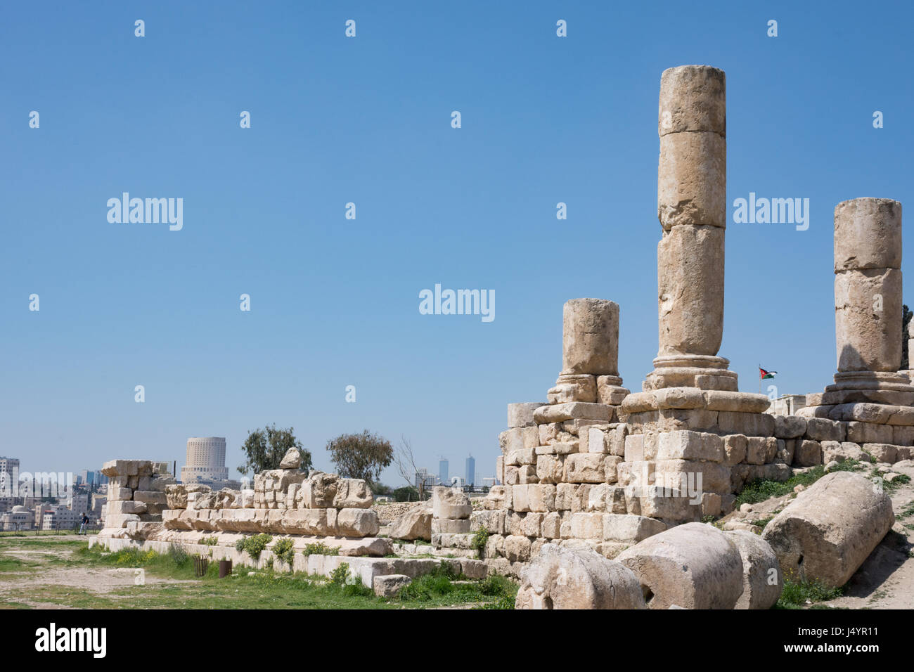 Ancient Roman ruins of Temple of Hercules at Amman Citadel with view of ...