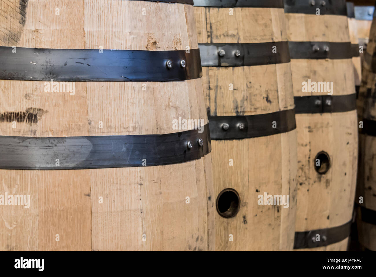 Row of Bourbon Barrels Standing Stock Photo - Alamy