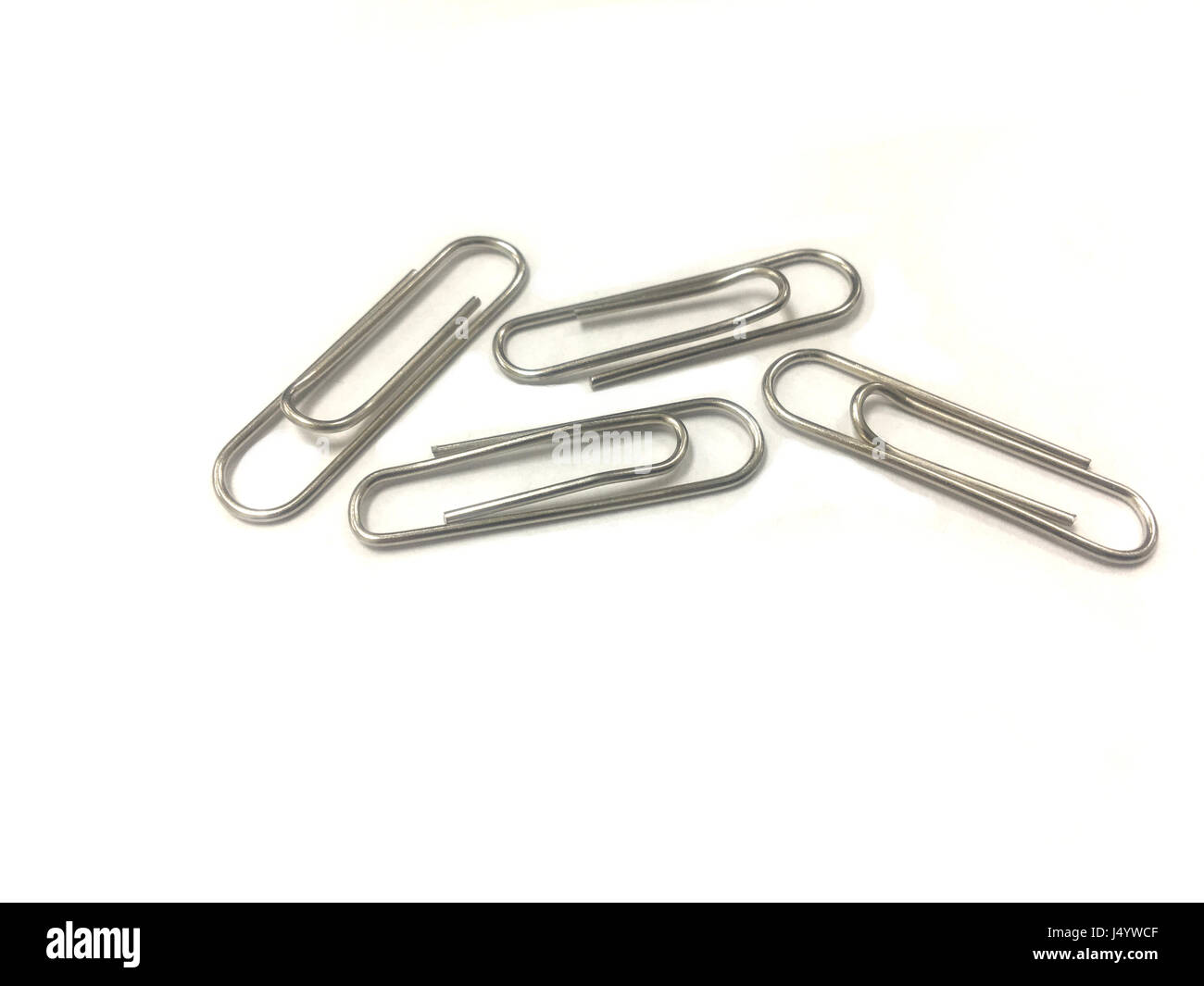 Paper clip on the white background Stock Photo - Alamy
