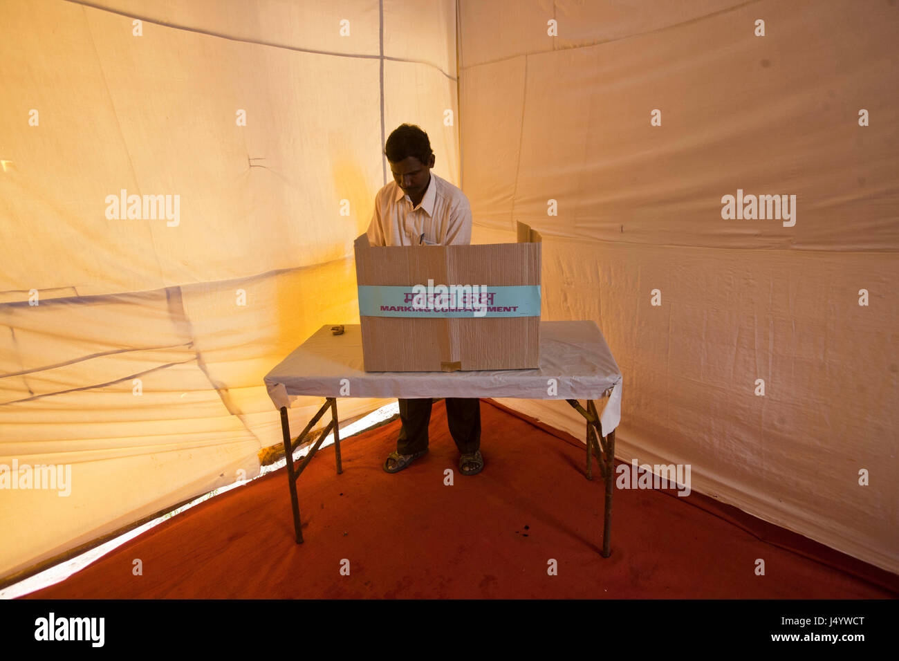 Election officer setting up the electronic voting machine, mumbai ...