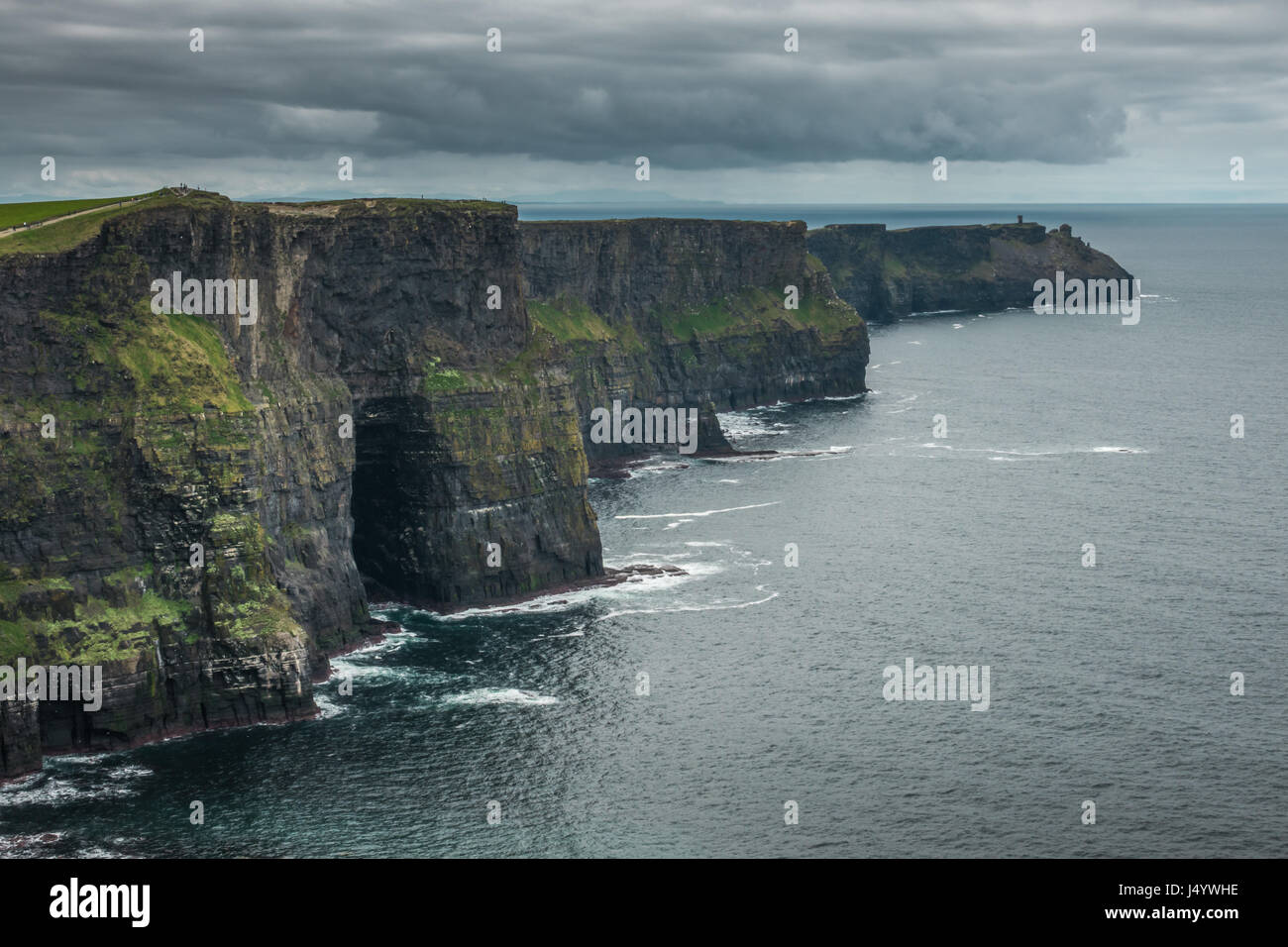 View over Cliffs of Moher on a overcast, cloudy and gloomy day, Ireland ...