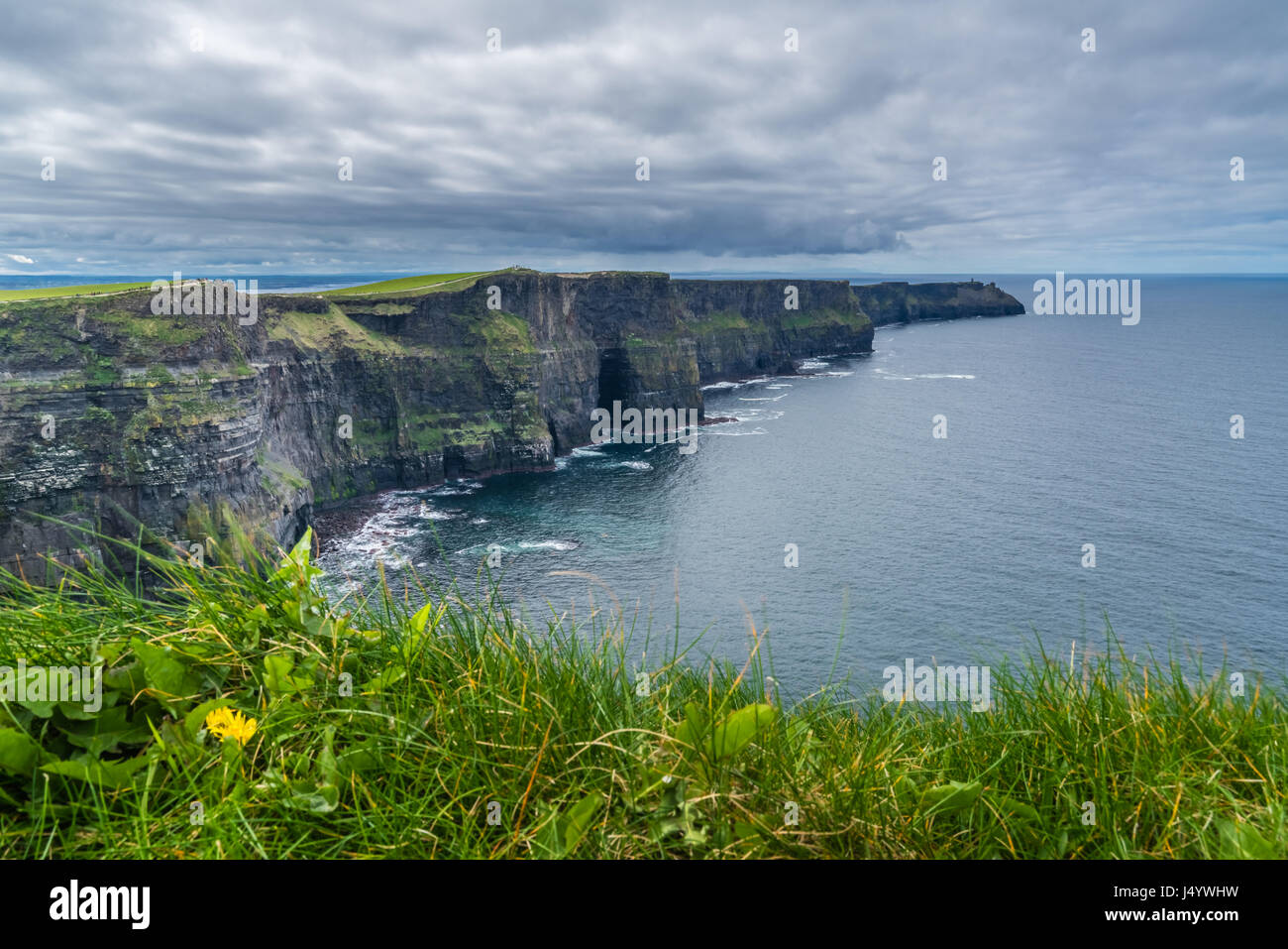 View over Cliffs of Moher on a overcast, cloudy and gloomy day, Ireland ...