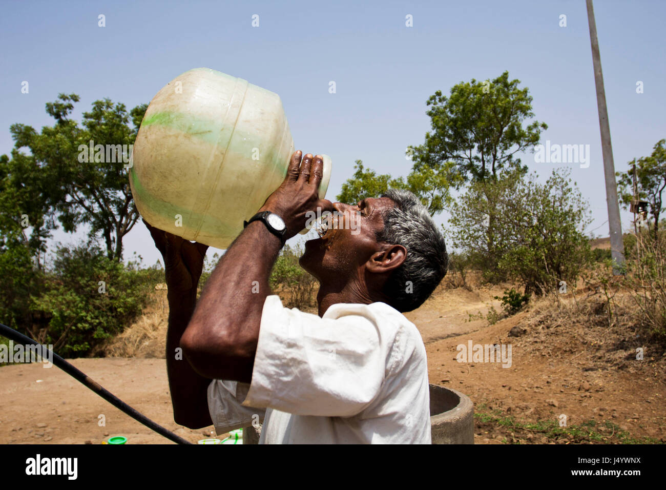 Indian man drinking water south hi-res stock photography and images - Alamy