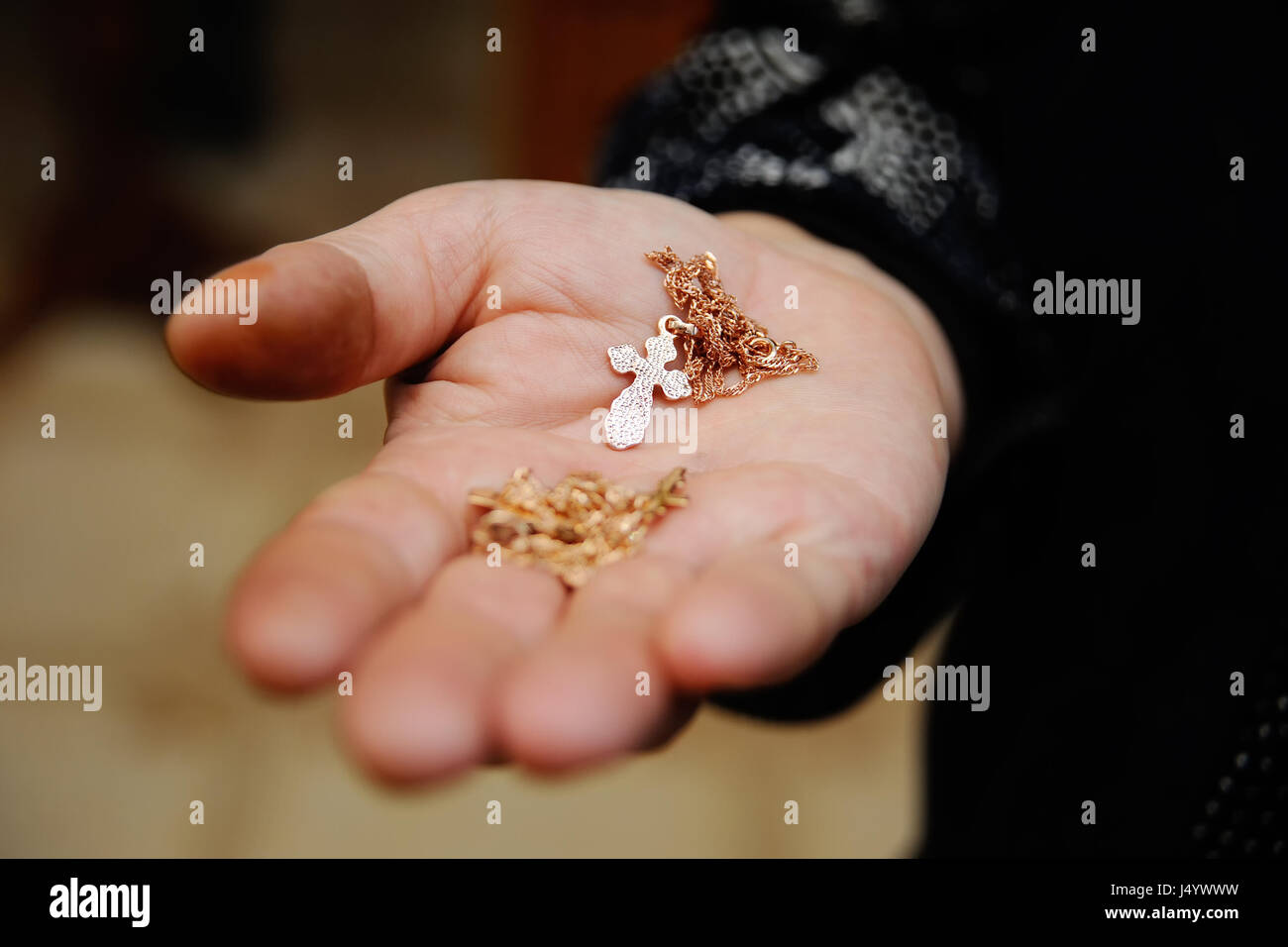 Orthodox cross in his hand Stock Photo - Alamy