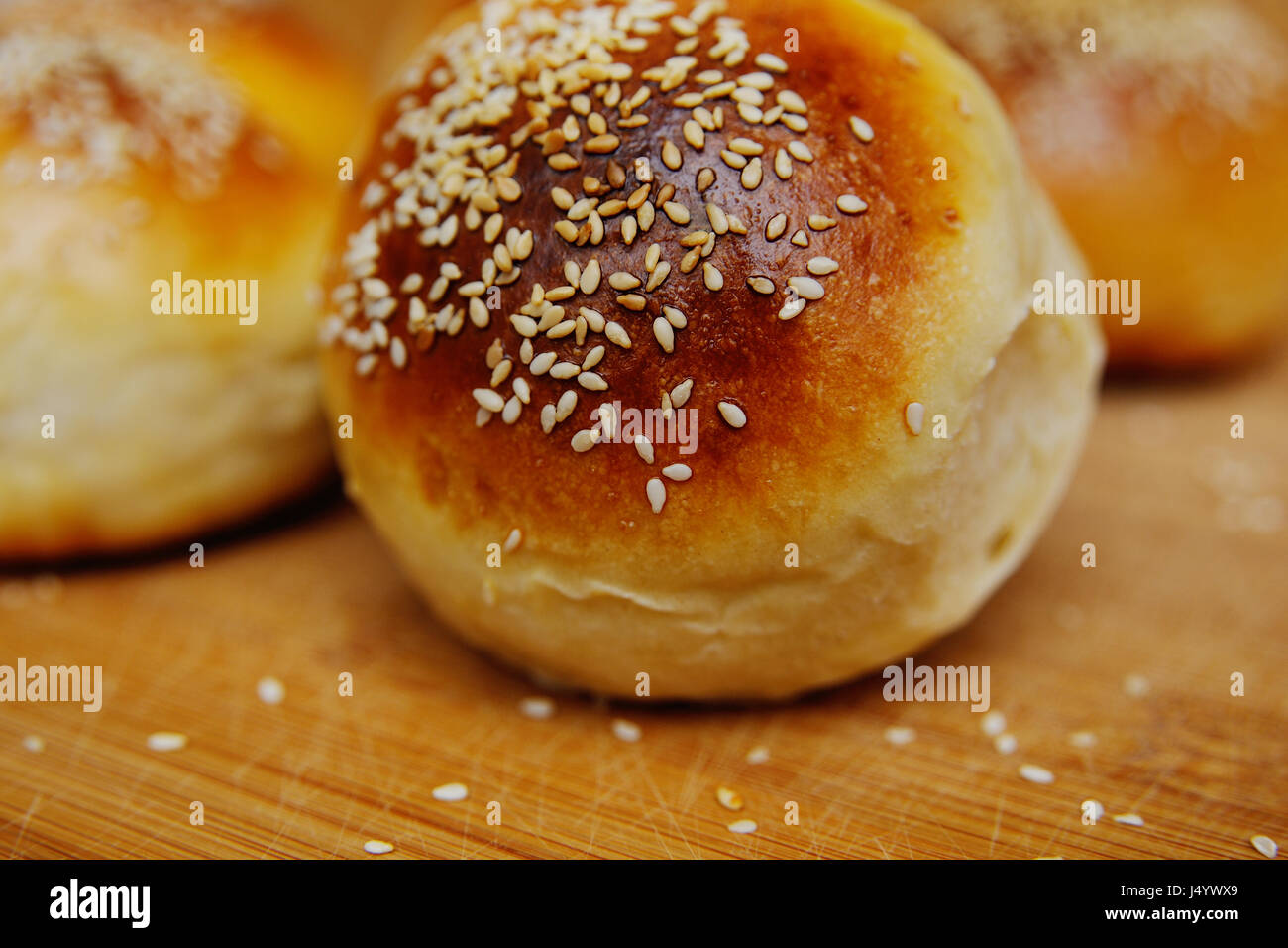bun with sesame seeds Stock Photo - Alamy
