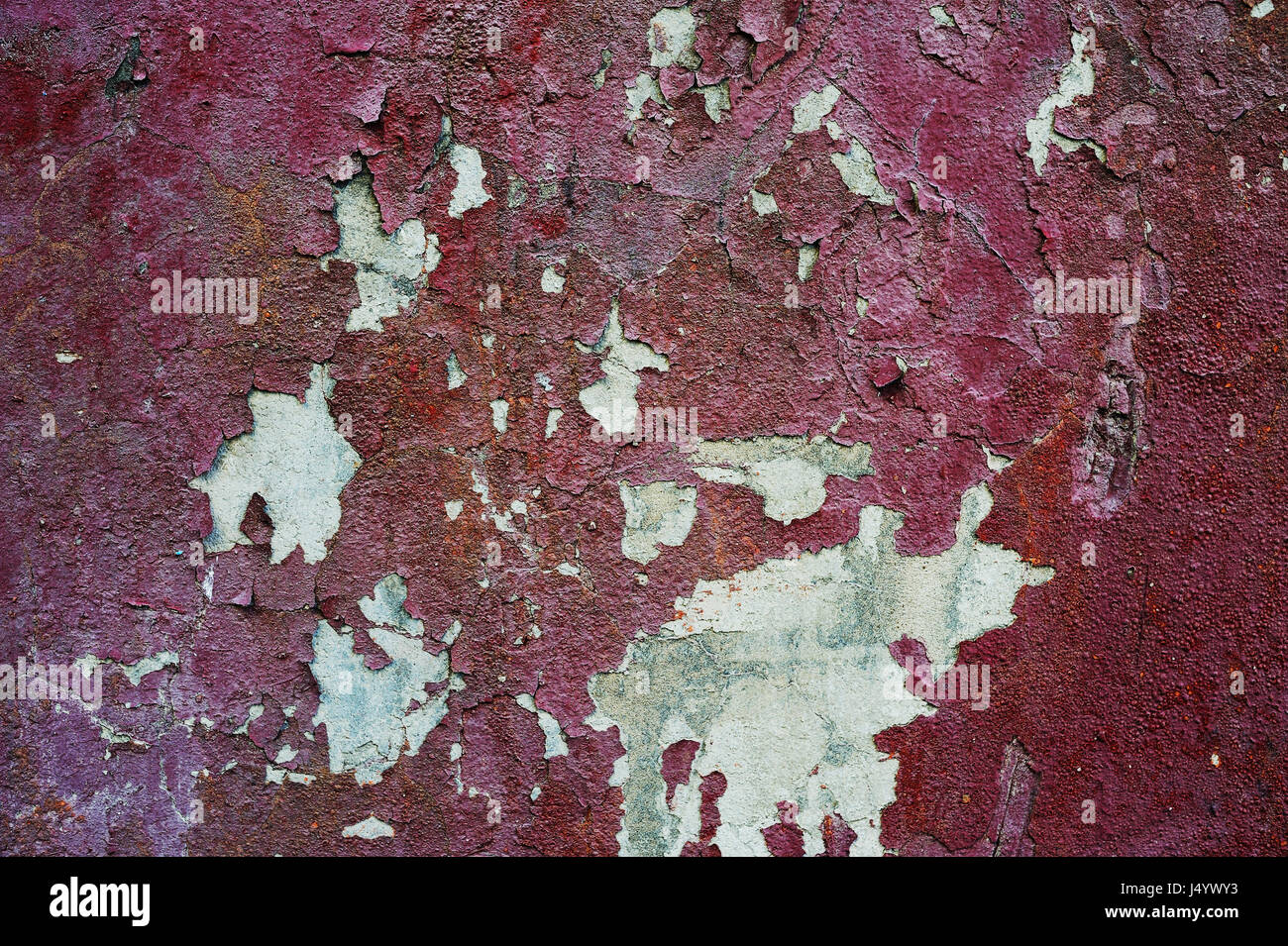 texture of red wall with paint peeling off Stock Photo - Alamy