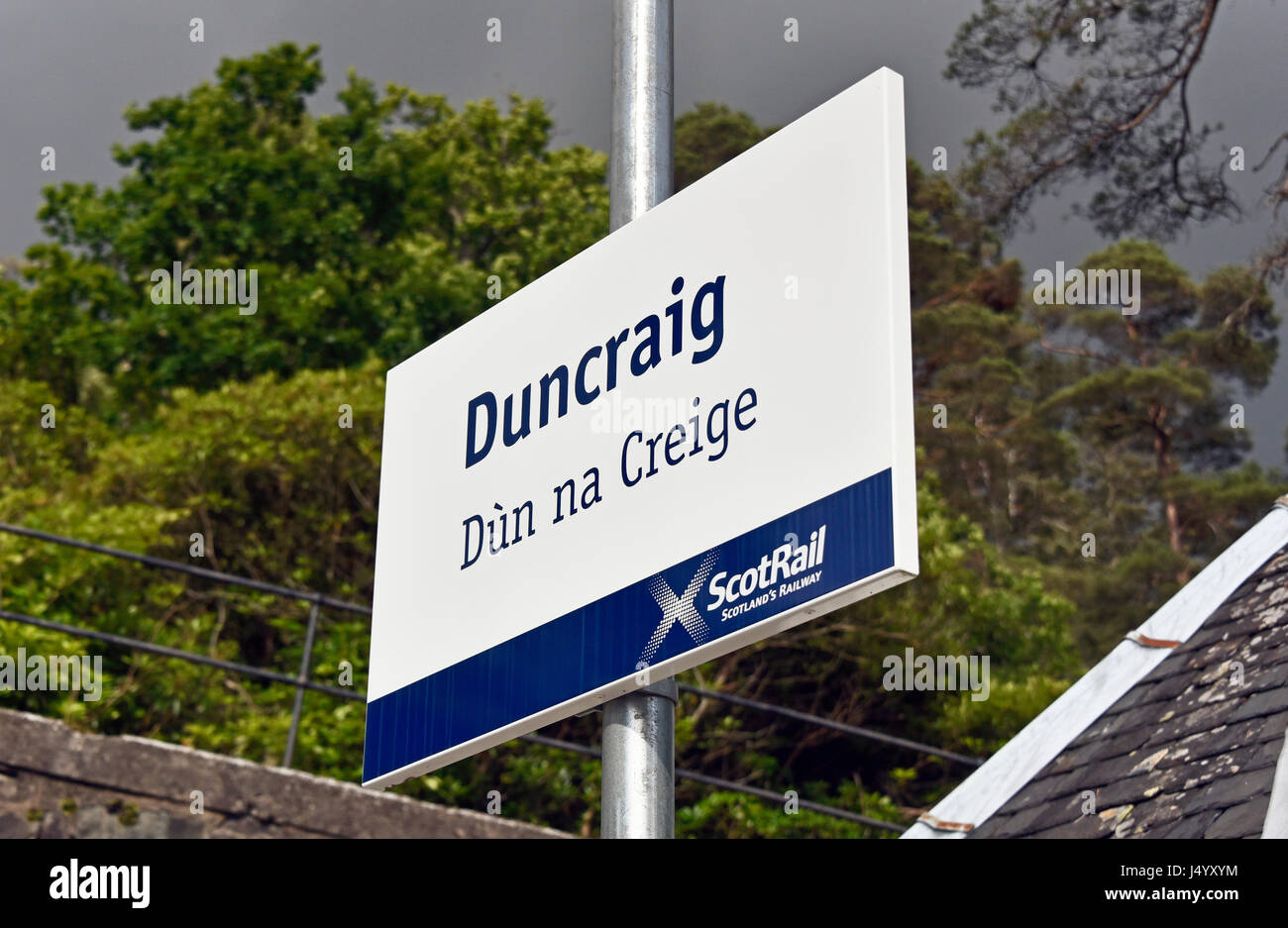 Station sign. Duncraig (Dun na Creige), Scotrail railway station ...