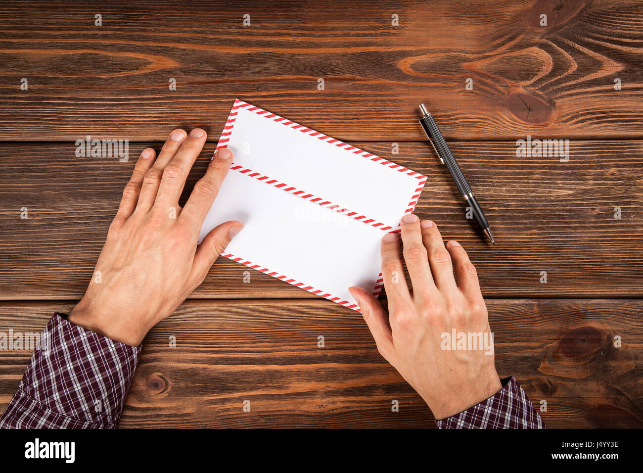 Holding an envelope hi-res stock photography and images - Alamy