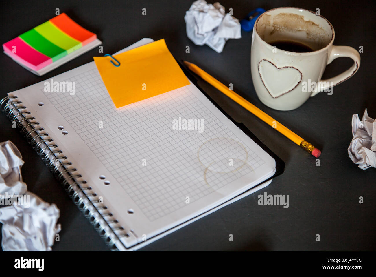 Creative block concept - blank notepad and crumpled paper Stock Photo ...