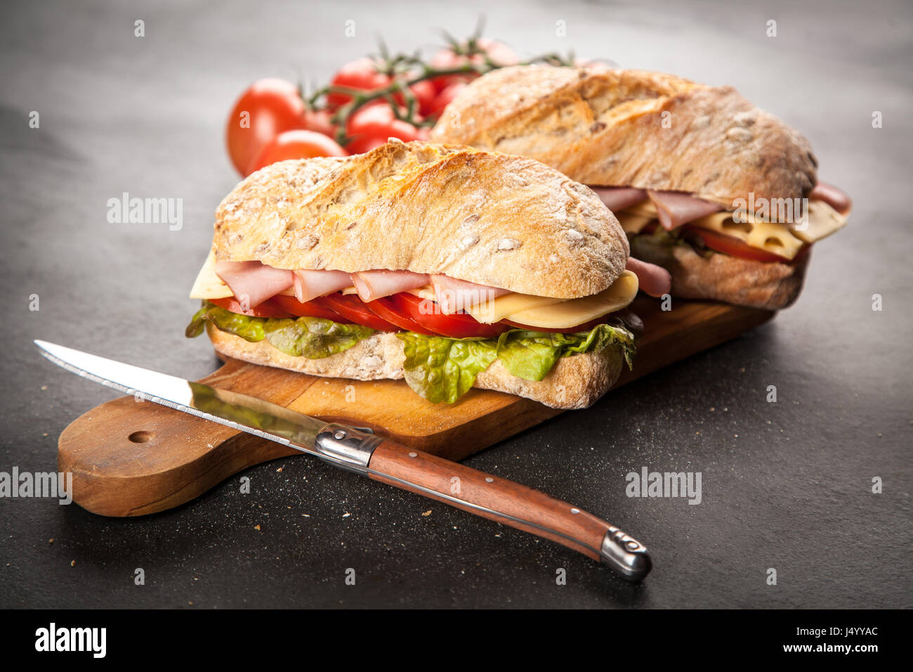 Ciabatta sandwich with vegetables, cheese and ham Stock Photo - Alamy