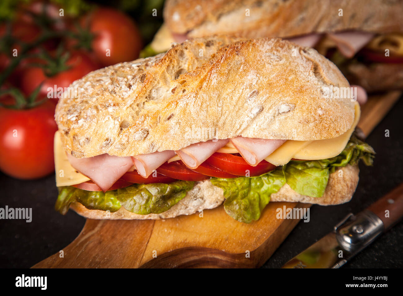 Ciabatta sandwich with vegetables, cheese and ham Stock Photo - Alamy