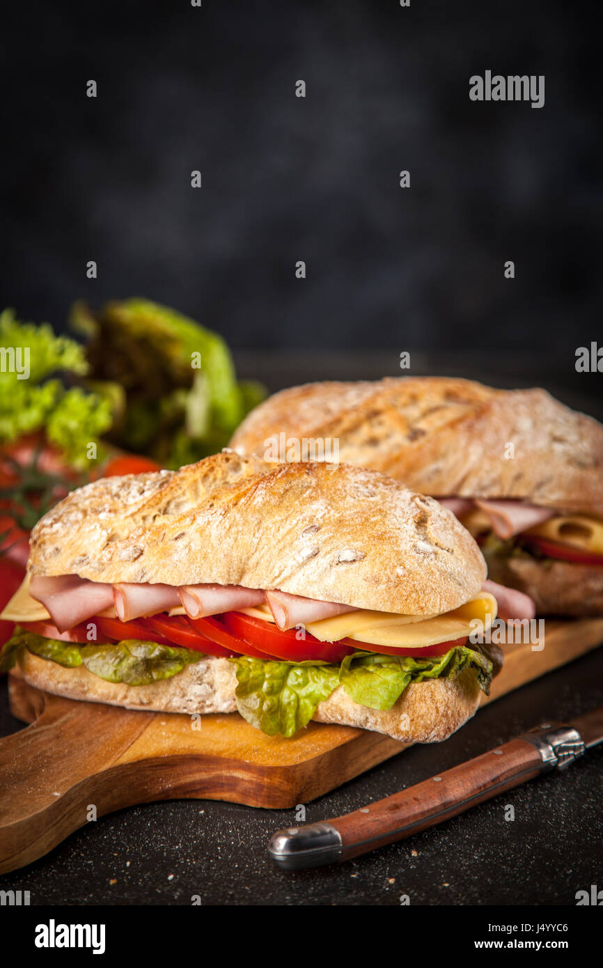 Ciabatta sandwich with vegetables, cheese and ham Stock Photo - Alamy