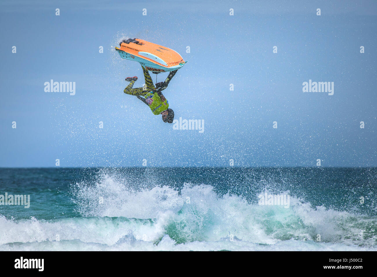 A jetski rider performing an aerial trick Jetski Jet ski Spectacular ...