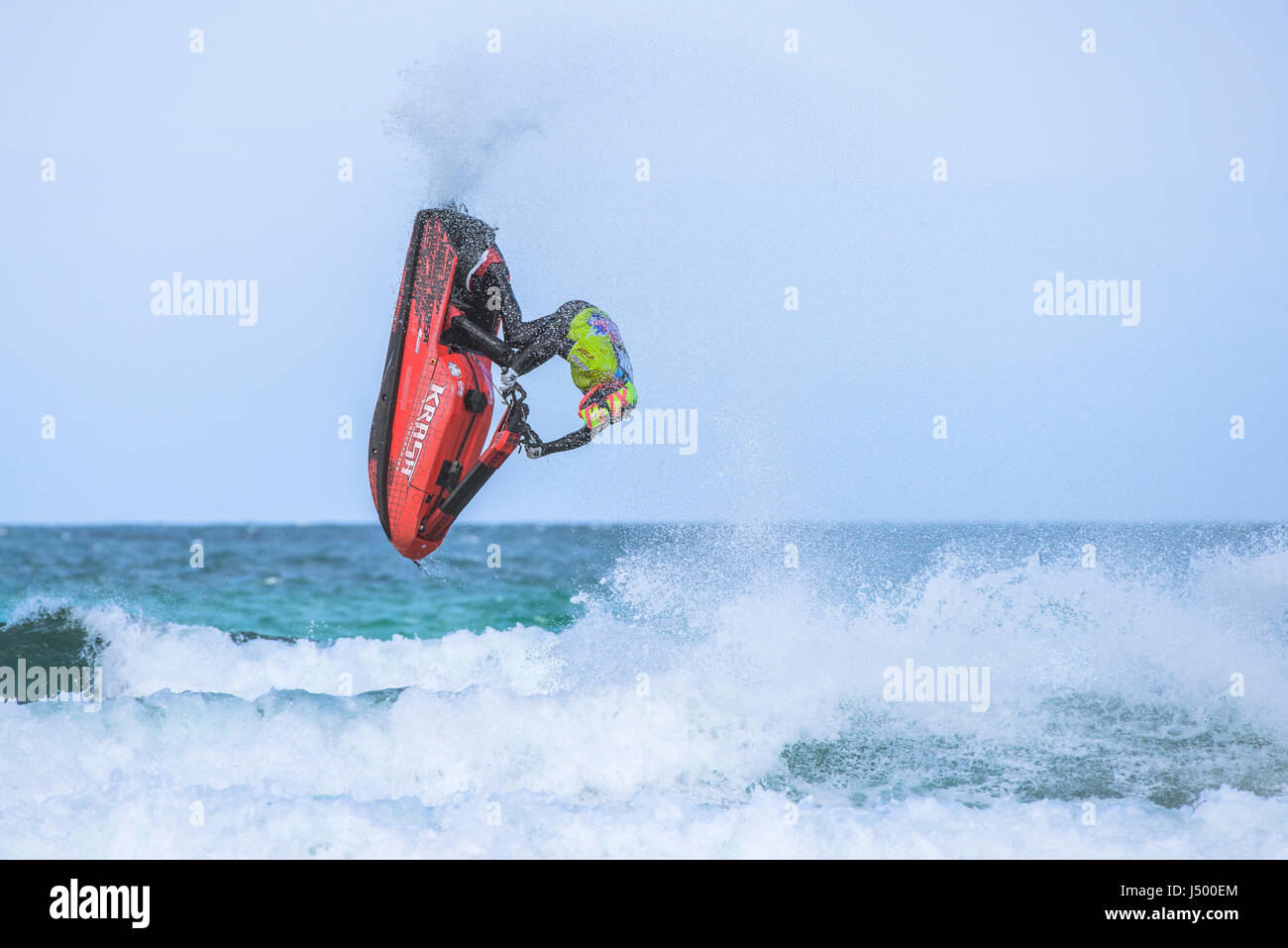 A jetski rider performing an aerial trick Jetski Jet ski Spectacular ...