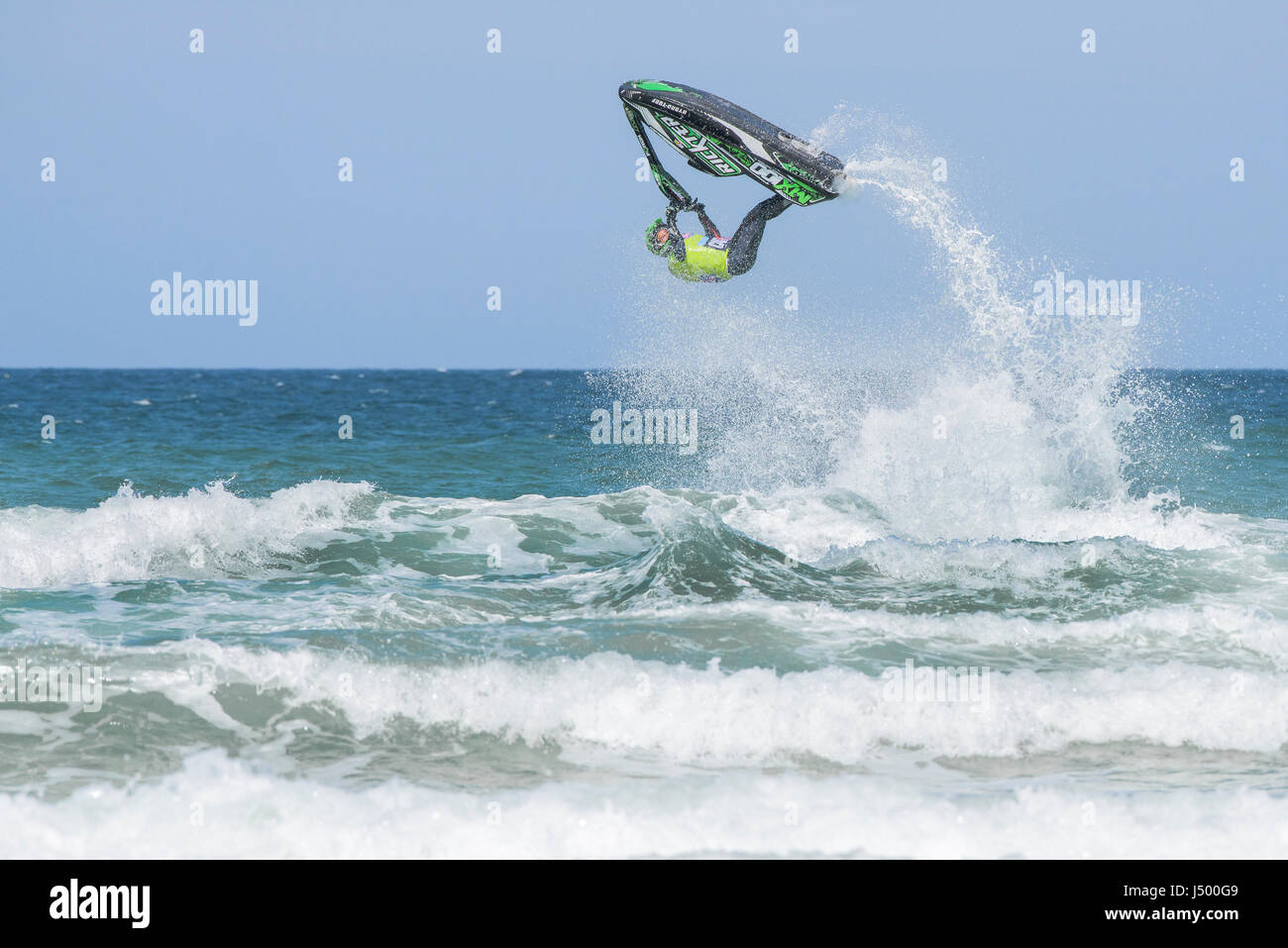 A jetski rider performing an aerial trick Jetski Jet ski Spectacular ...