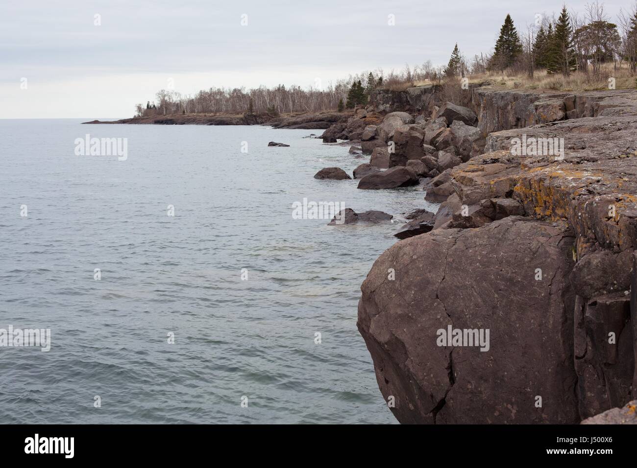 The rocky shoreline of Lake Superior at Gooseberry Falls State Park in ...