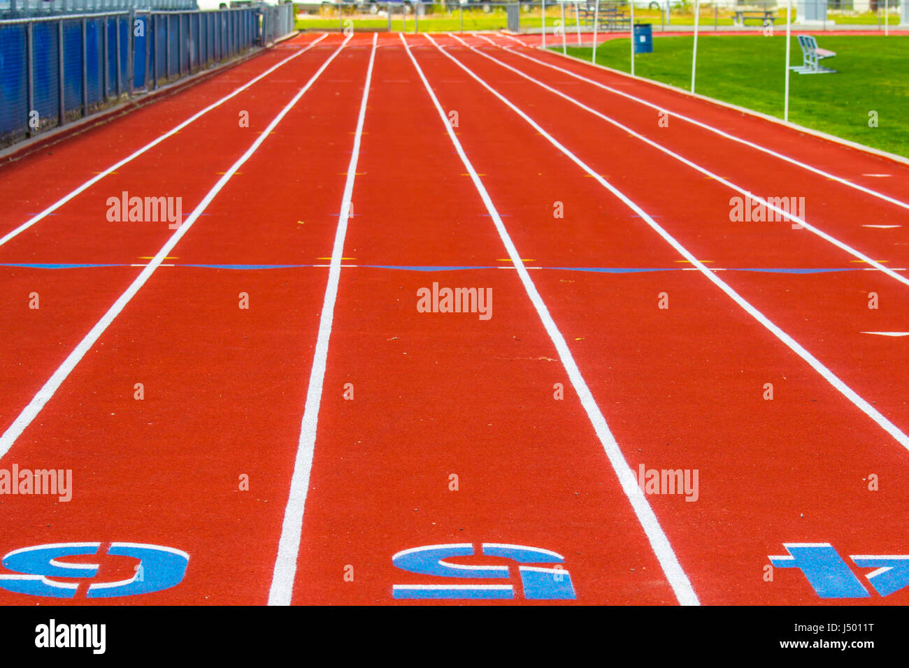 Orange Track With While Lines For Lanes Stock Photo - Alamy