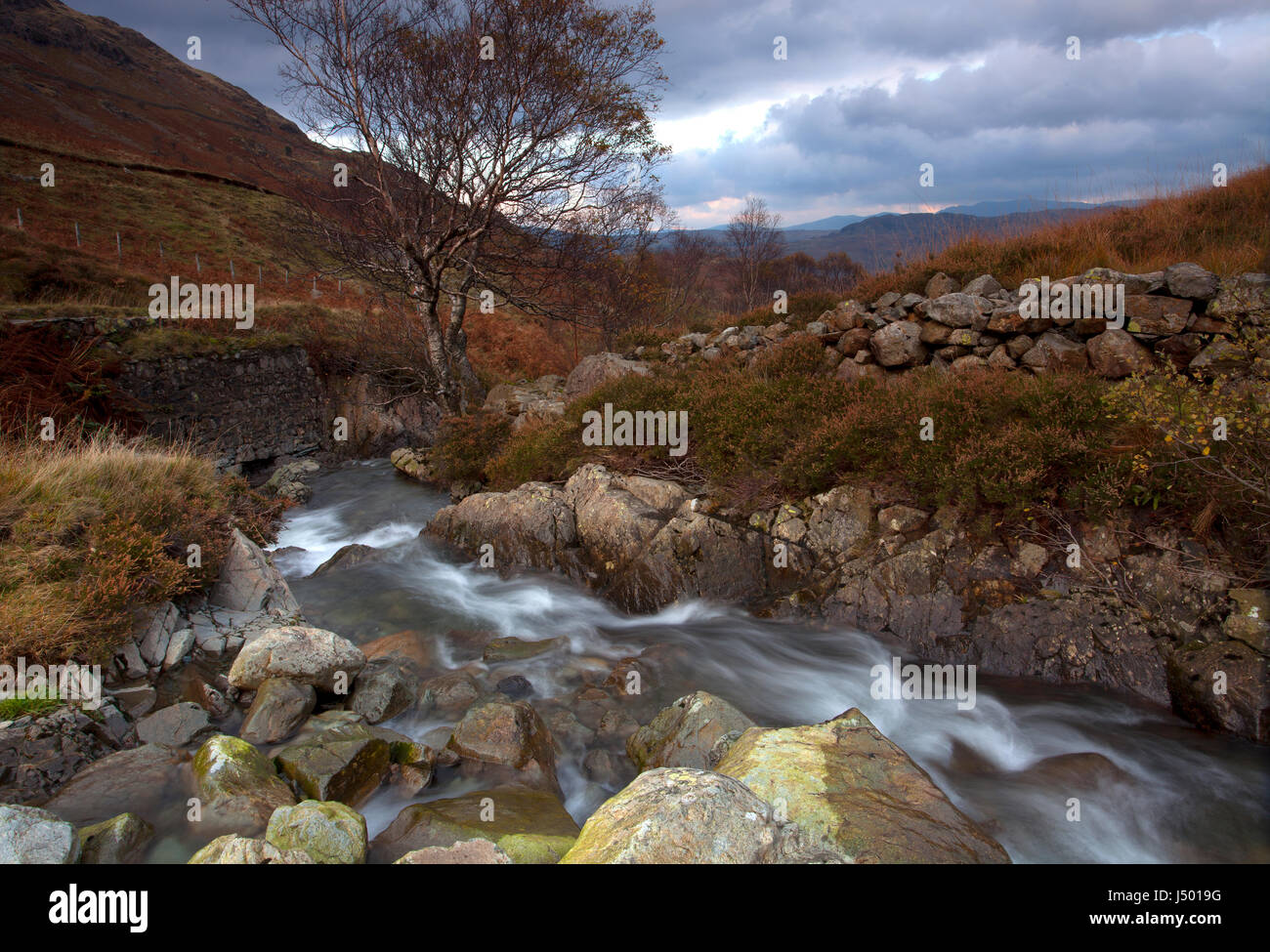A close up, long exposure view of the rocky stream at the head of ...