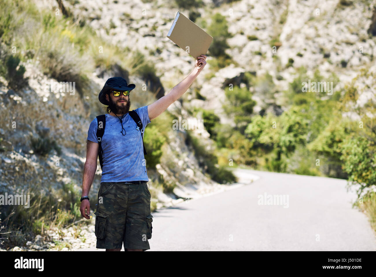 Hitch hiker sign hi-res stock photography and images - Alamy
