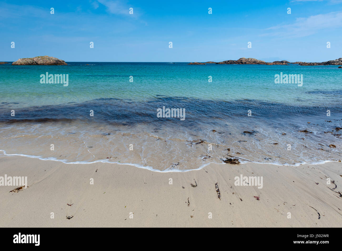Red Rocks Beach The Isle Of Coll Scotland Stock Photo - Alamy