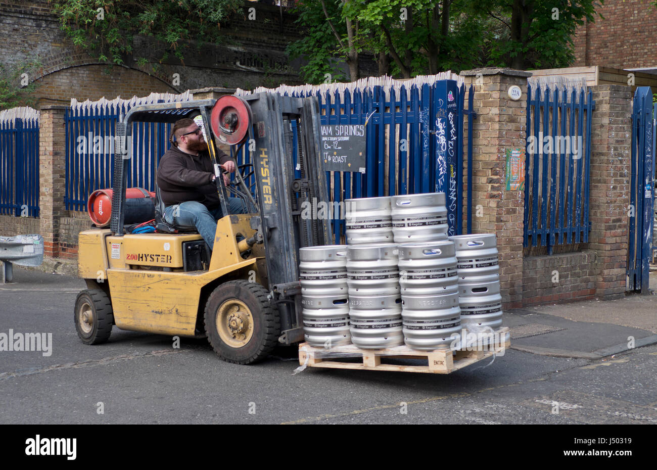 Worker lifting barrels craft hi-res stock photography and images - Alamy