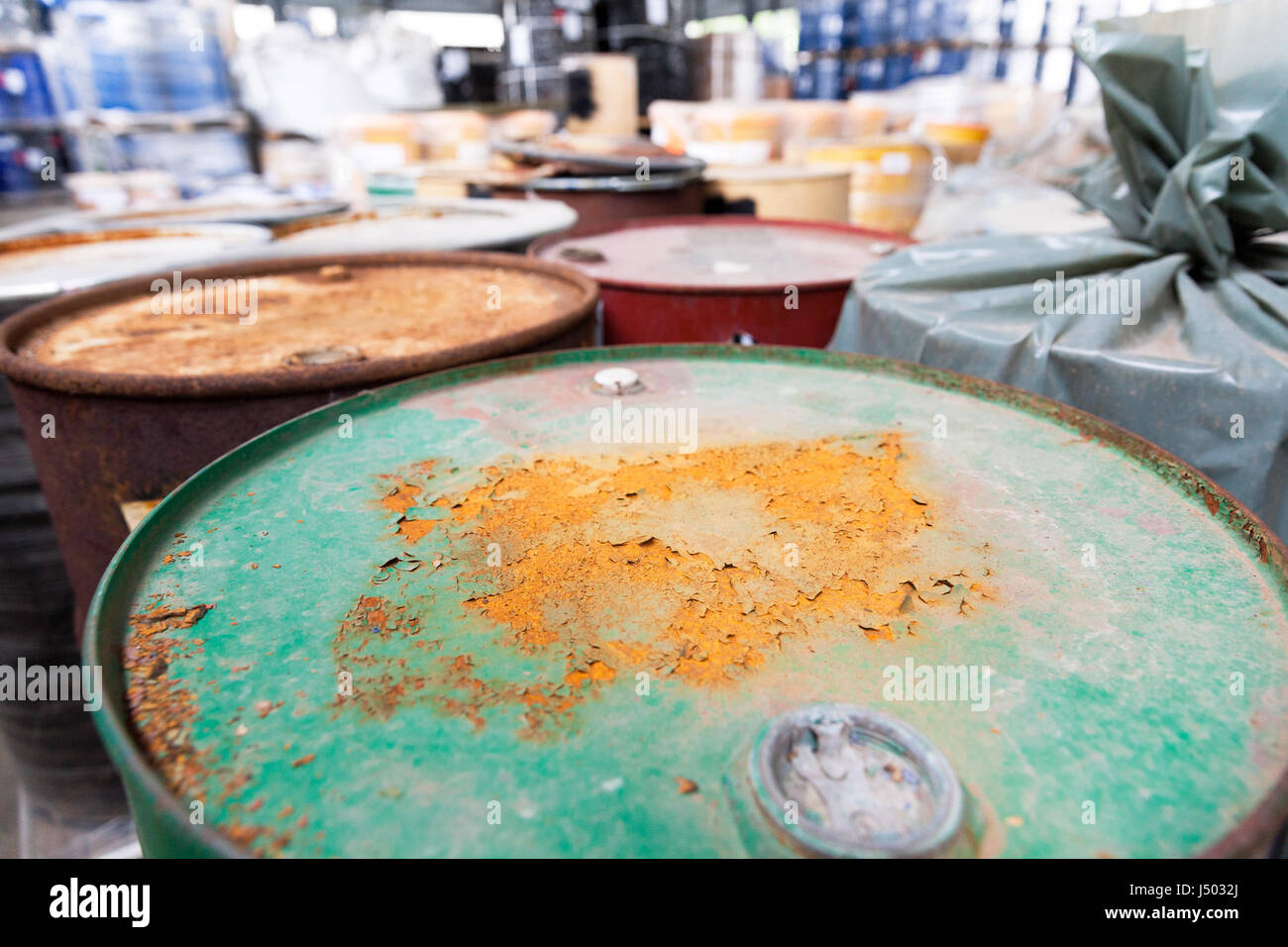 Toxic chemical waste dumped in rusty barrels Stock Photo - Alamy