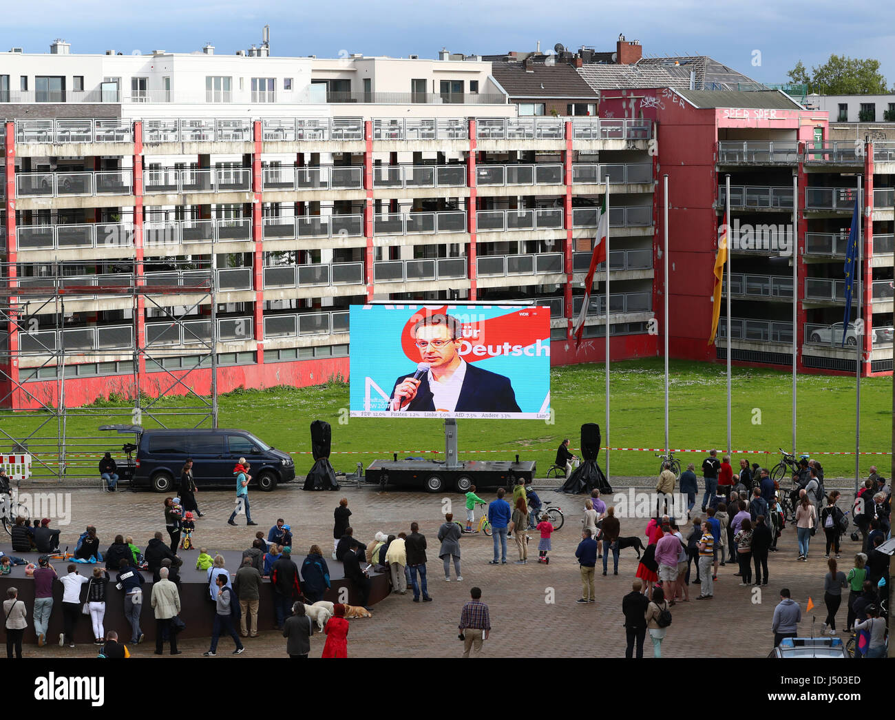 AfD prime candidate Markus Pretzell pictured on a projection screen ...